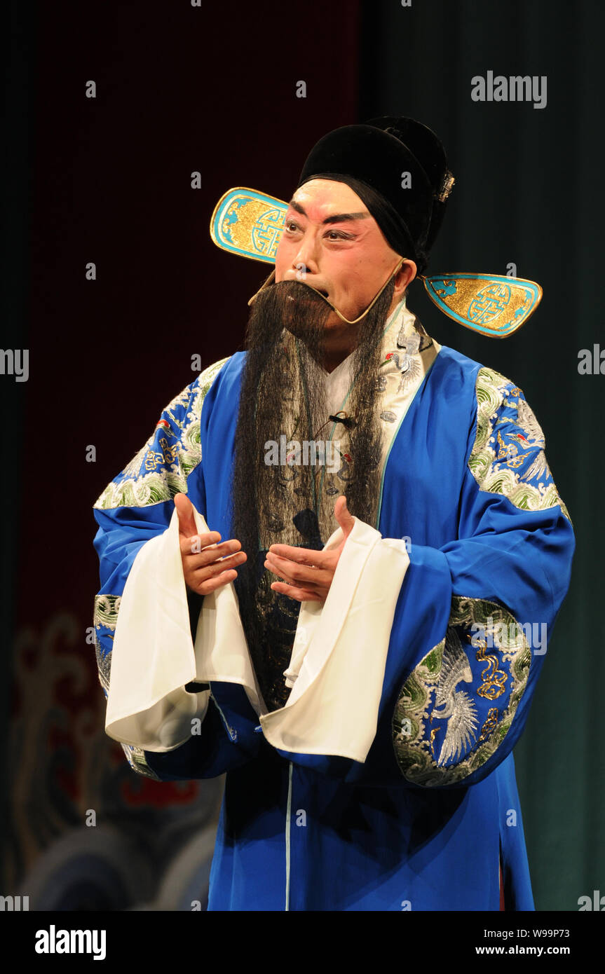 --File--A player dressed in the costume of jing, one of the 4 main ...