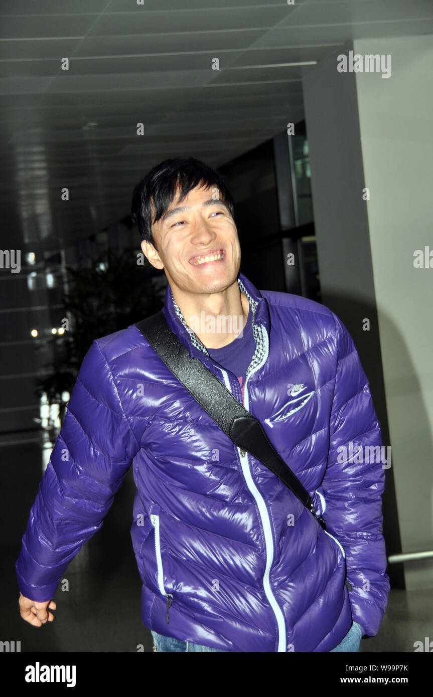 Chinese star hurdler Liu Xiang arrives at the Pudong International ...