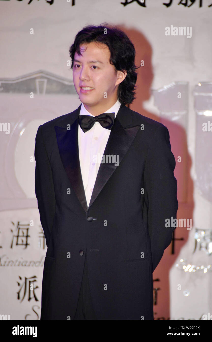 Chinese pianist Li Yundi attends an exhibition celebrating the 10th ...