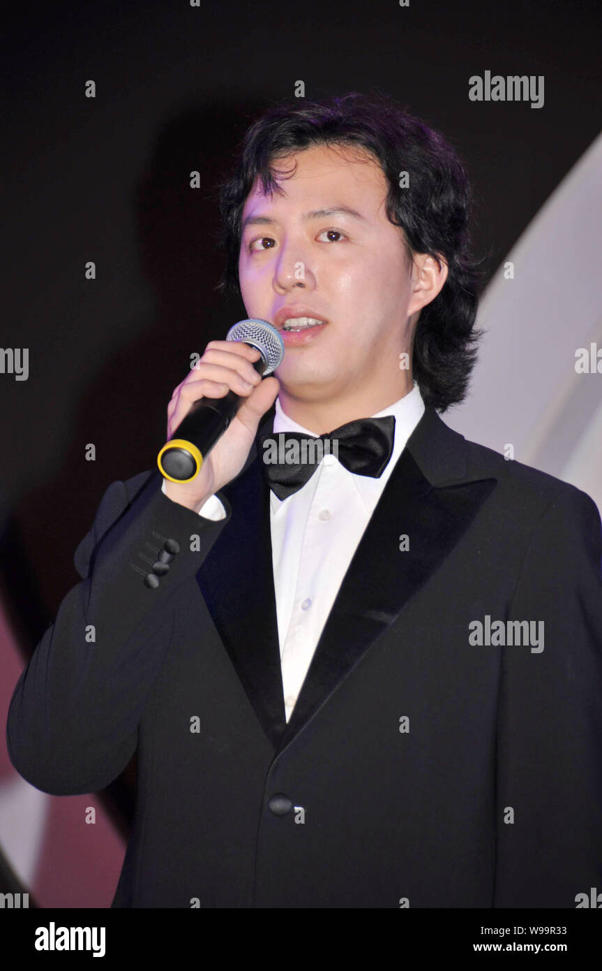 Chinese pianist Li Yundi attends an exhibition celebrating the 10th ...