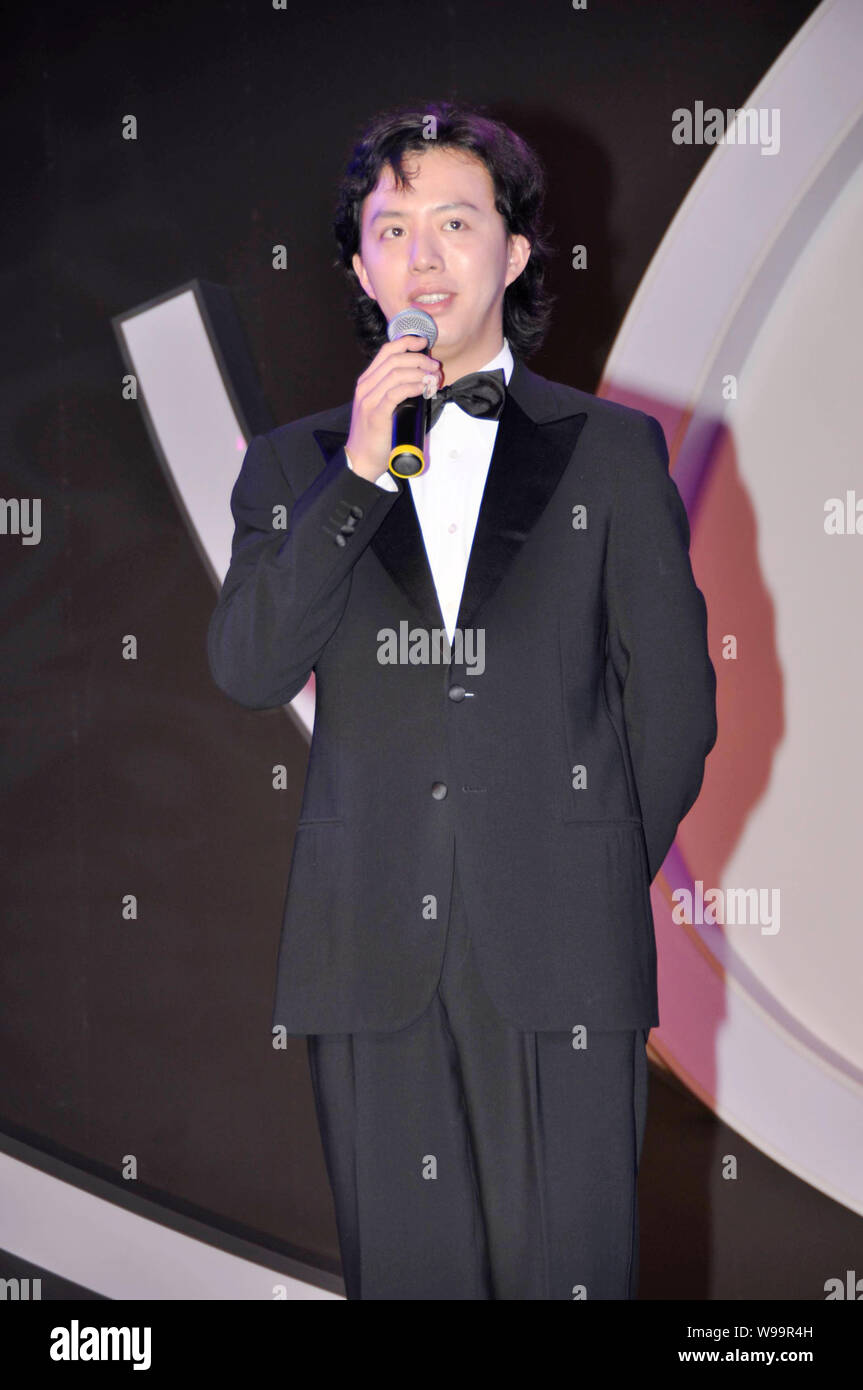 Chinese pianist Li Yundi attends an exhibition celebrating the 10th ...