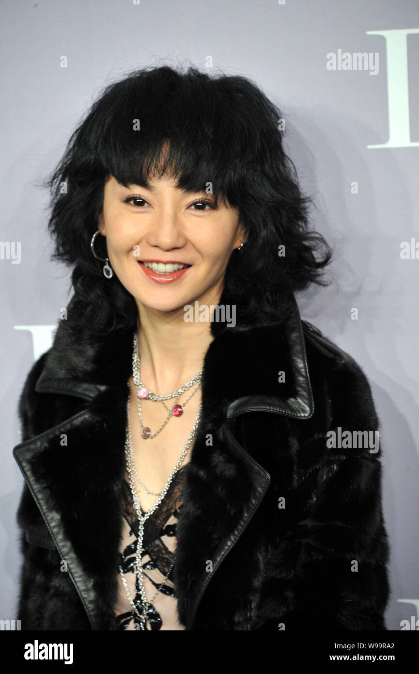 Hong Kong Actress Maggie Cheung Poses At The Opening Ceremony Of The Dior Flagship Store At Shin