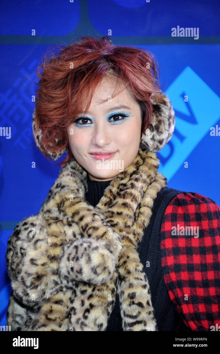 Chinese actress Li Xinru attends the 2011 China Trends Awards ceremony ...