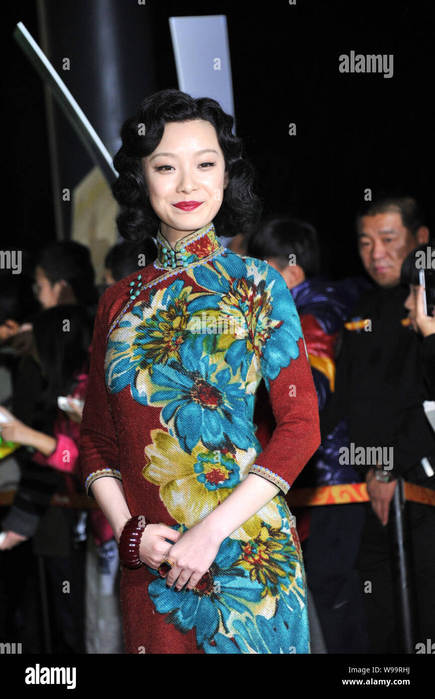 Chinese actress Ni Ni poses on the red carpet for the screening of the ...