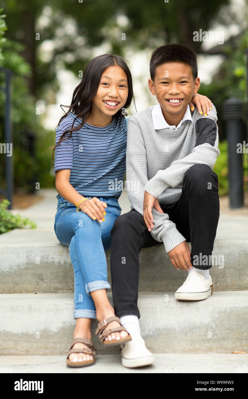 Portrait of an Asian brother and his little sister Stock Photo - Alamy