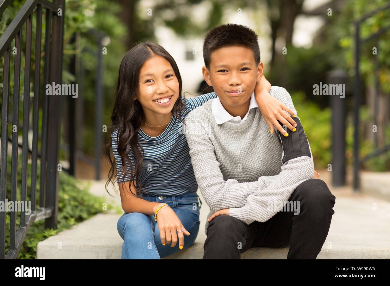 Portrait of an Asian brother and his little sister Stock Photo - Alamy