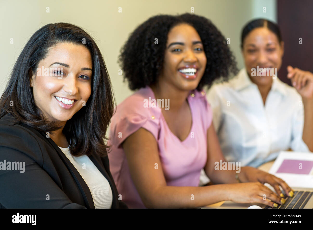 Multi ethnic group of women at work Stock Photo - Alamy
