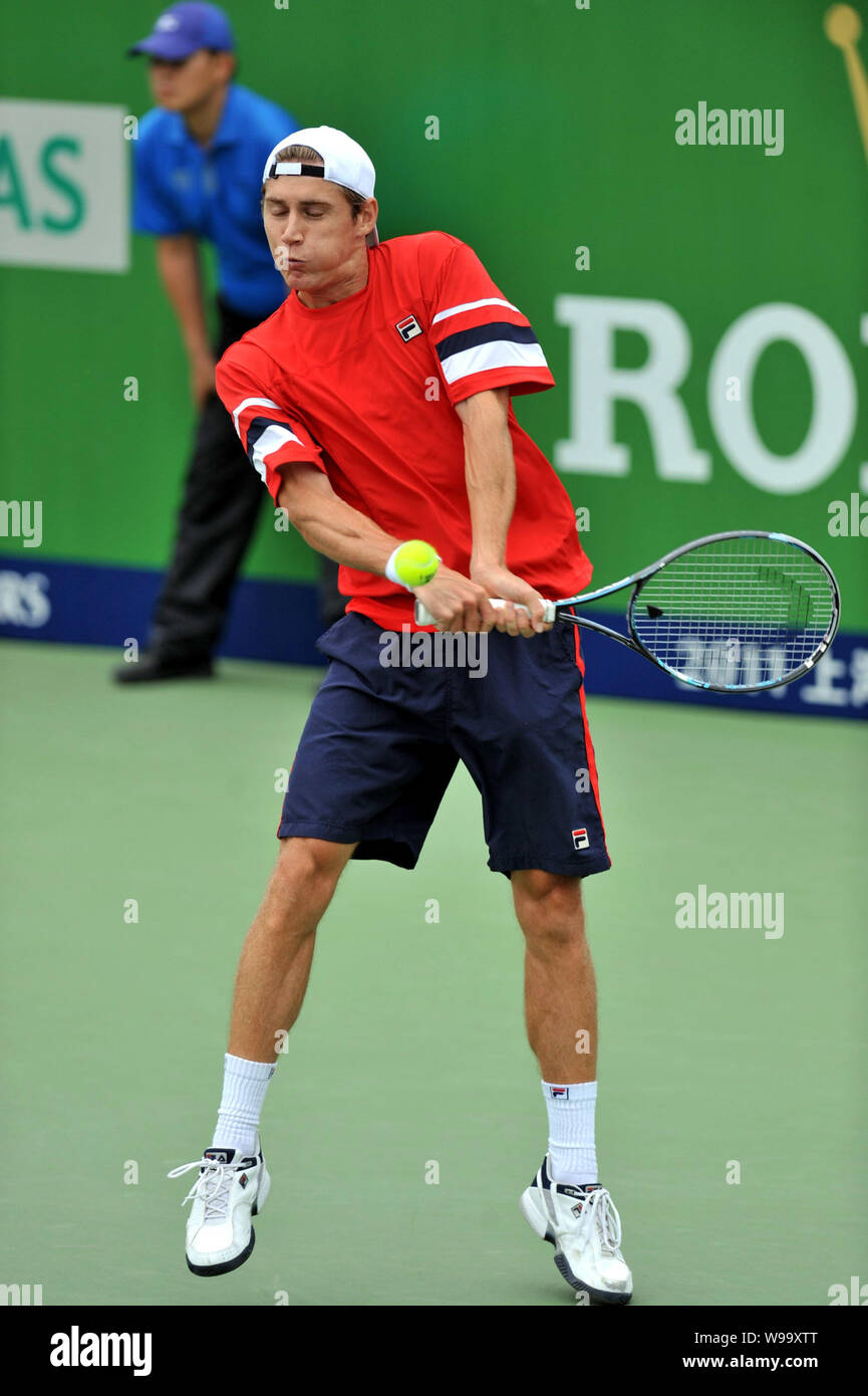 Matthew Ebden of Australia returns a shot against Ryan Harrison of the ...