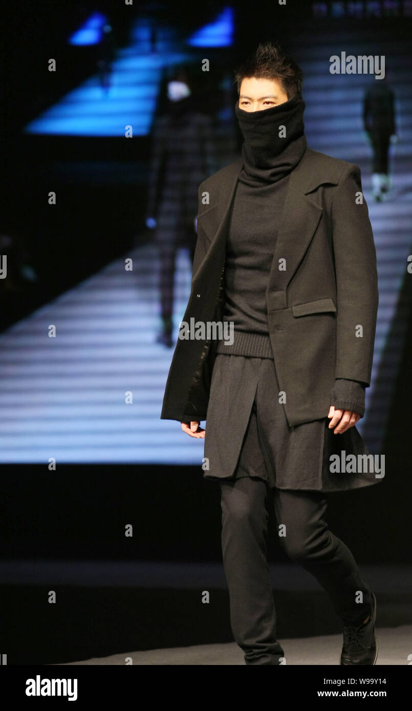 A model parades to show the new creation in the Taipei IN Style fashion ...