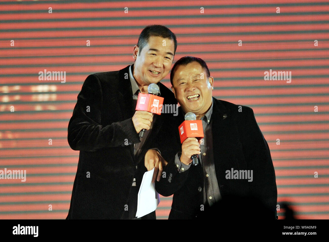 Chinese director and actor Zhang Guoli, left, and Hong Kong actor Eric Tseng attend a ceremony ...
