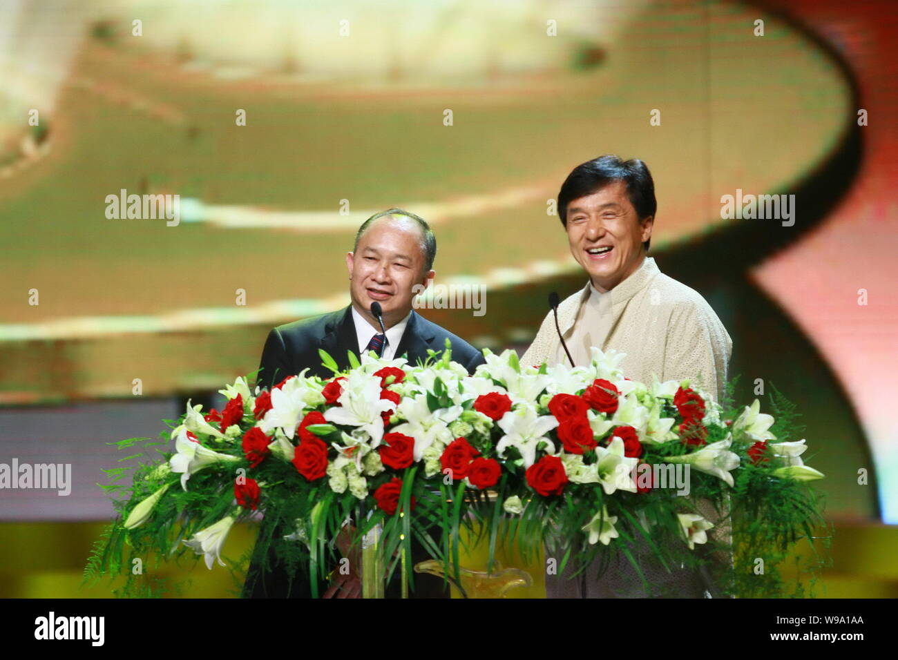 Hong Kong film director John Woo (L) and kungfu superstar Jackie Chan ...