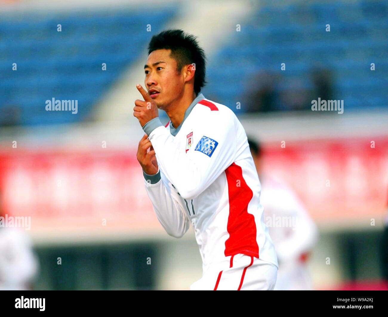Gao Jianqing of Chinas Changchun Yatai FC celebrates after scoring a ...