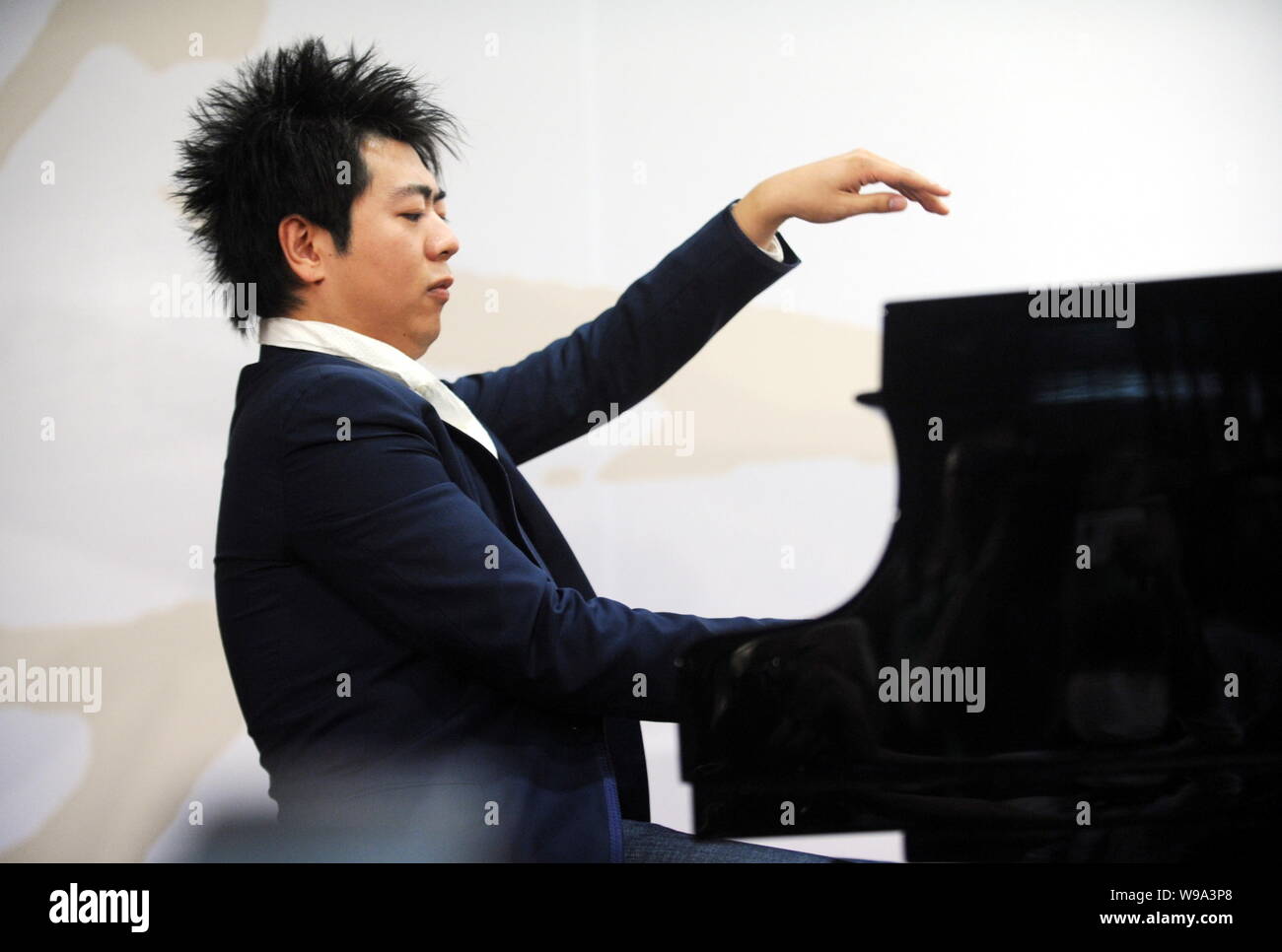 Chinese pianist Lang Lang performs during a launching ceremony for his ...