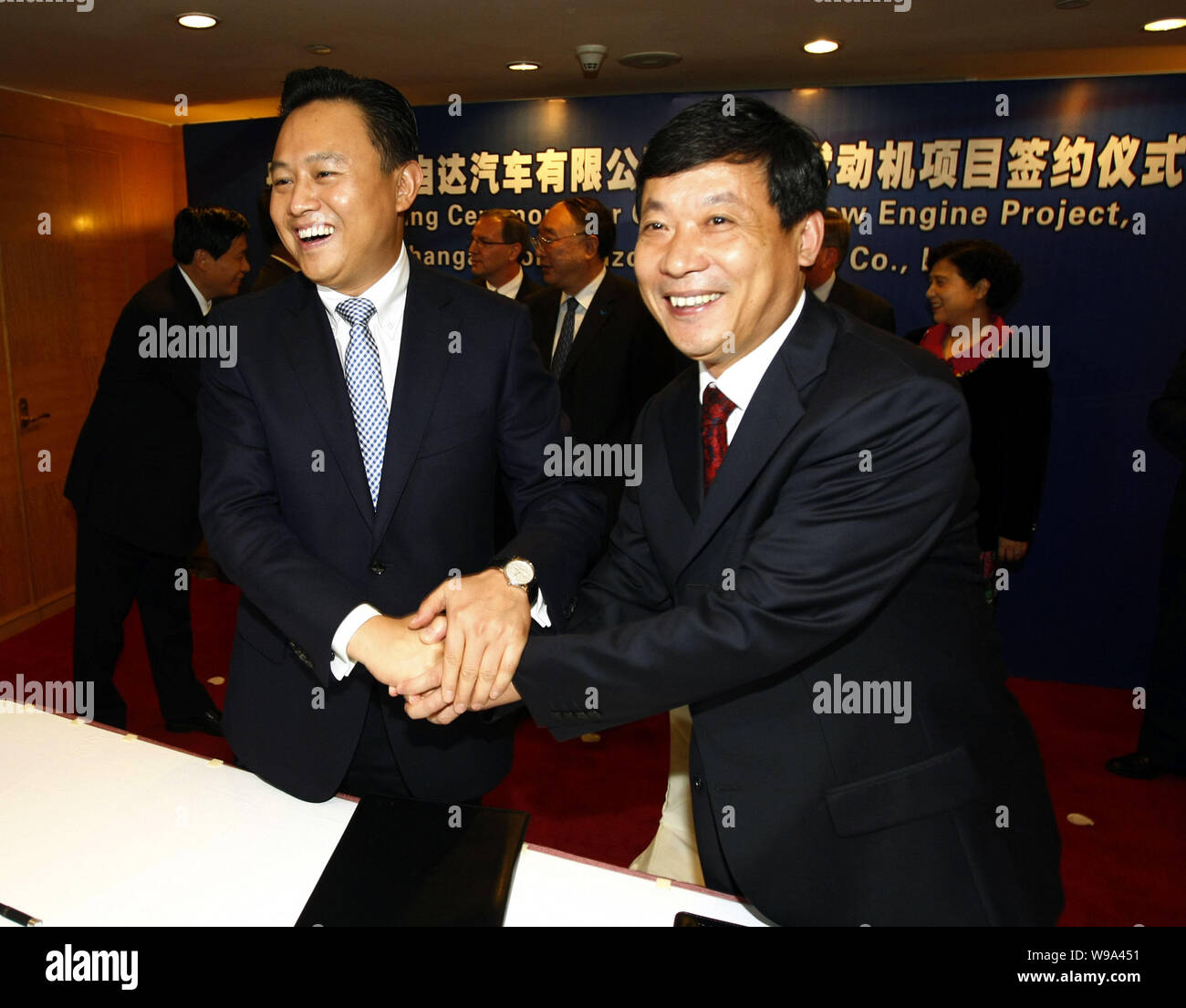 Xu Liuping, left, Chairman and President of Changan Automobile Group ...