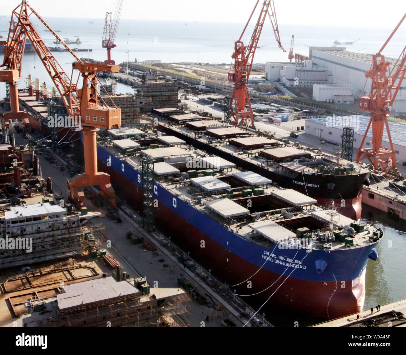 Bulk cargo ships are being built at the shipyard of Shanhaiguan ...
