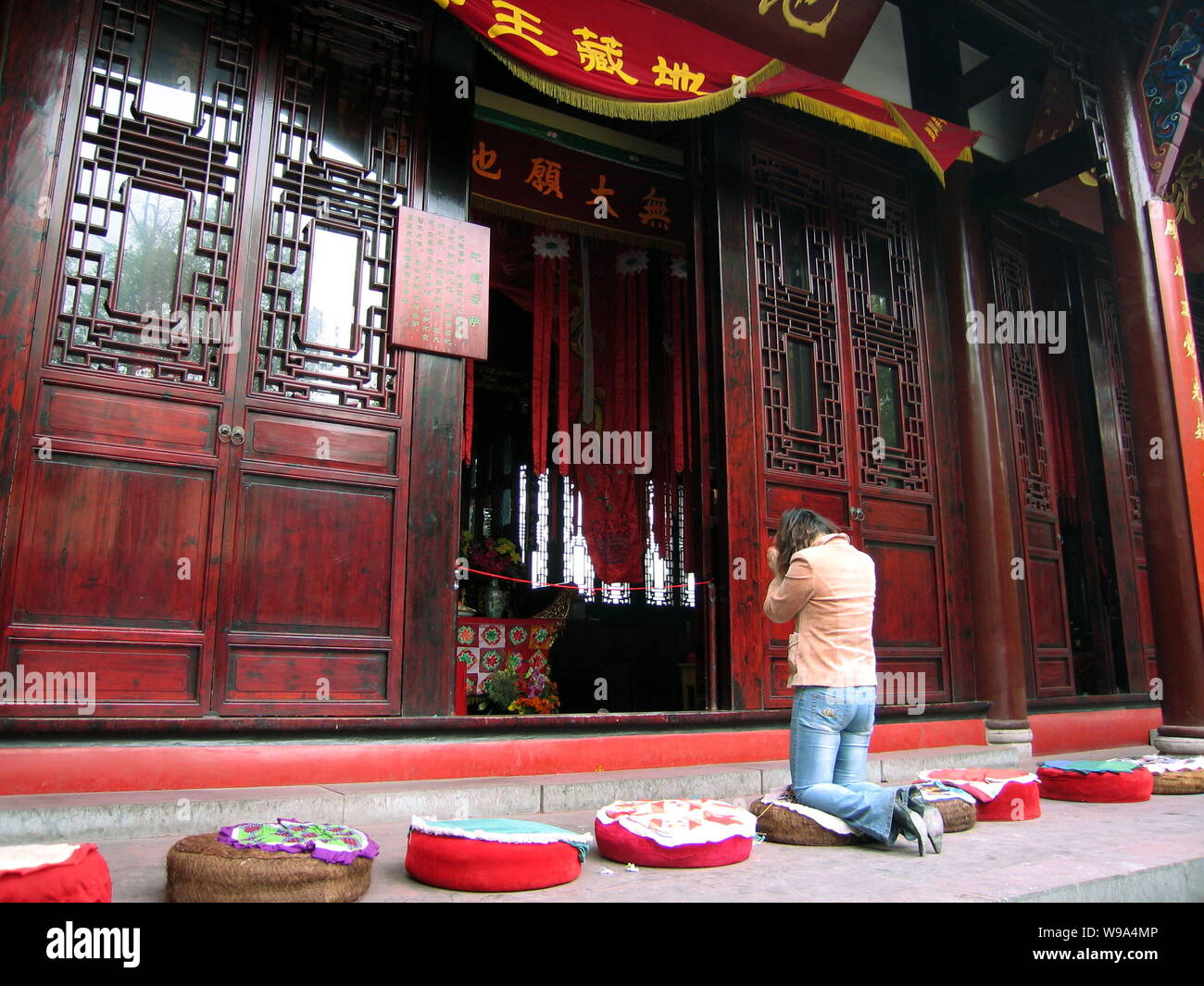 --FILE--A Chinese visitor prays at Zhaojue Temple in Chengdu city ...