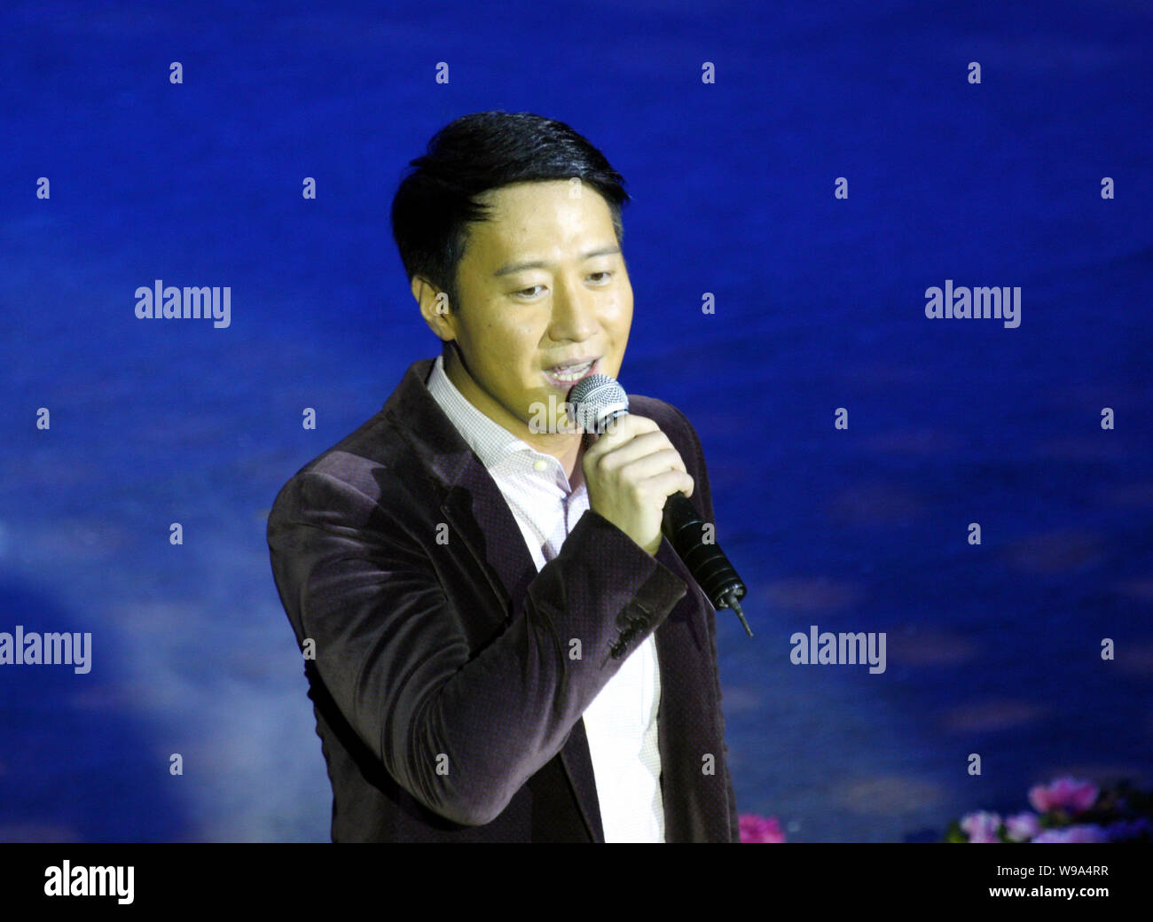 Hong Kong actor and singer Leon Lai performs at a ceremony to celebrate ...