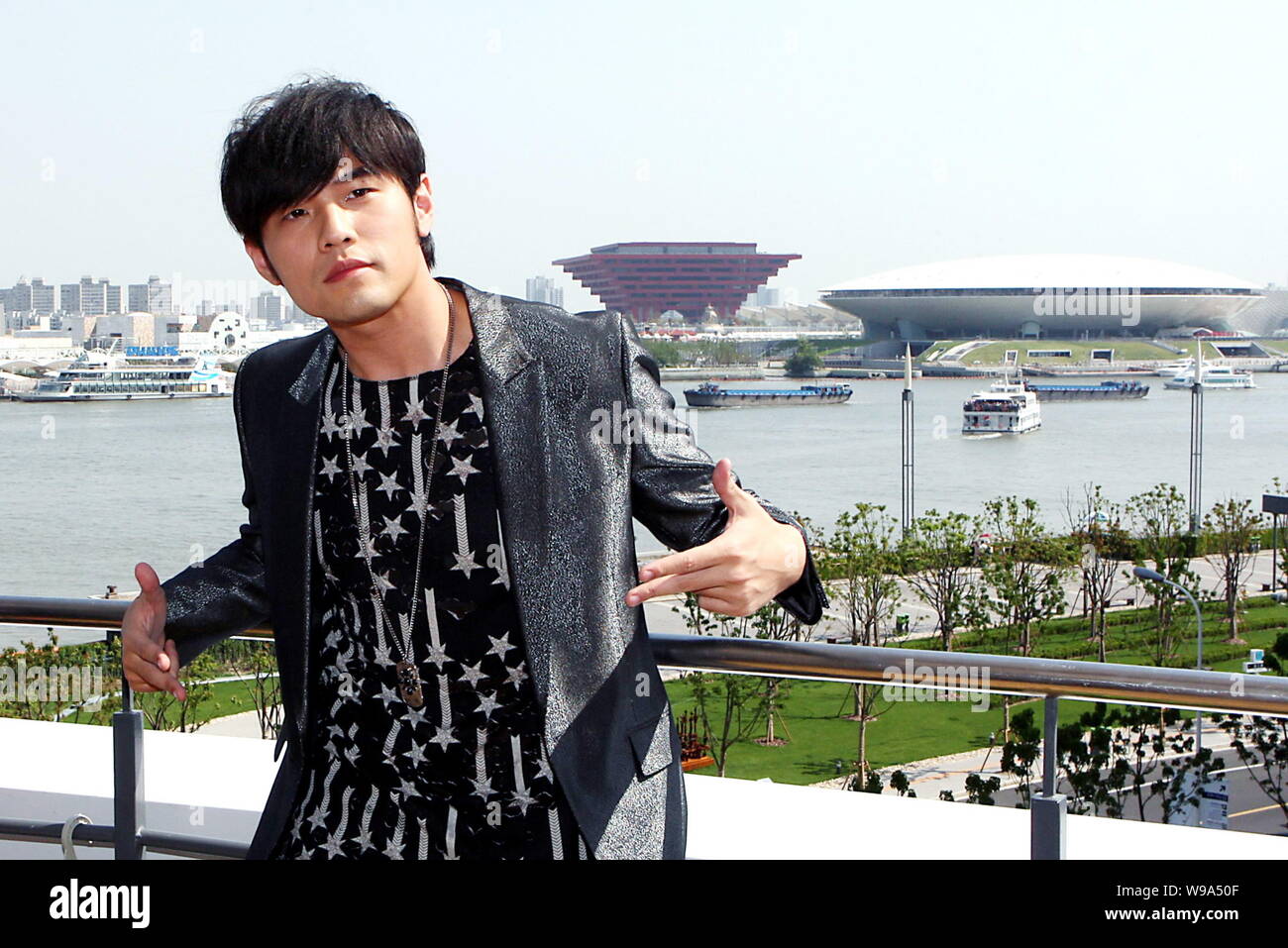 Taiwanese singer and actor Jay Chou poses during a press conference for ...
