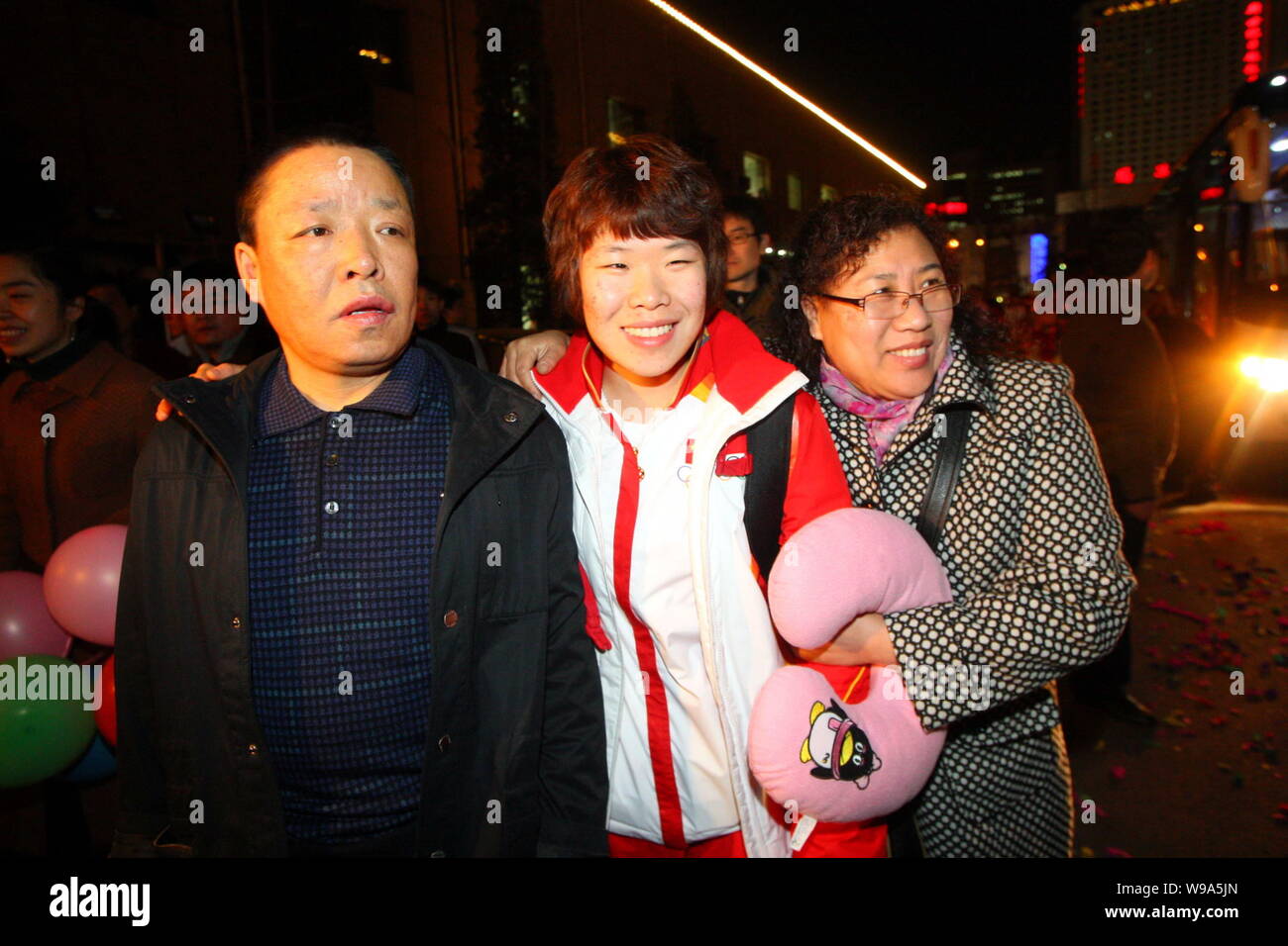 Zhou Yang, center, two gold medals holder at the Vancouver Winter Games ...