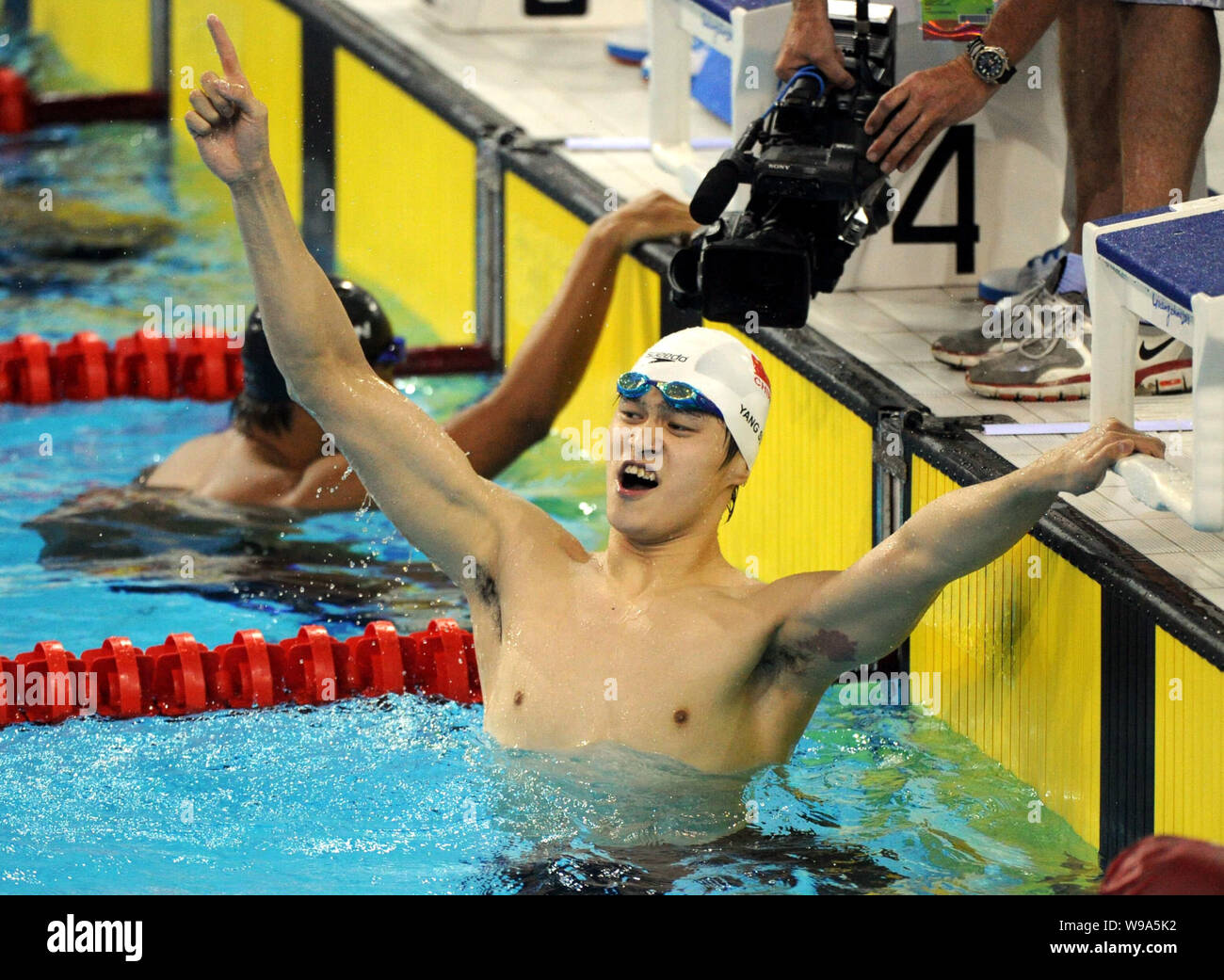 Chinas Sun Yang celebrates in the pool after winning the mens 4x200m ...