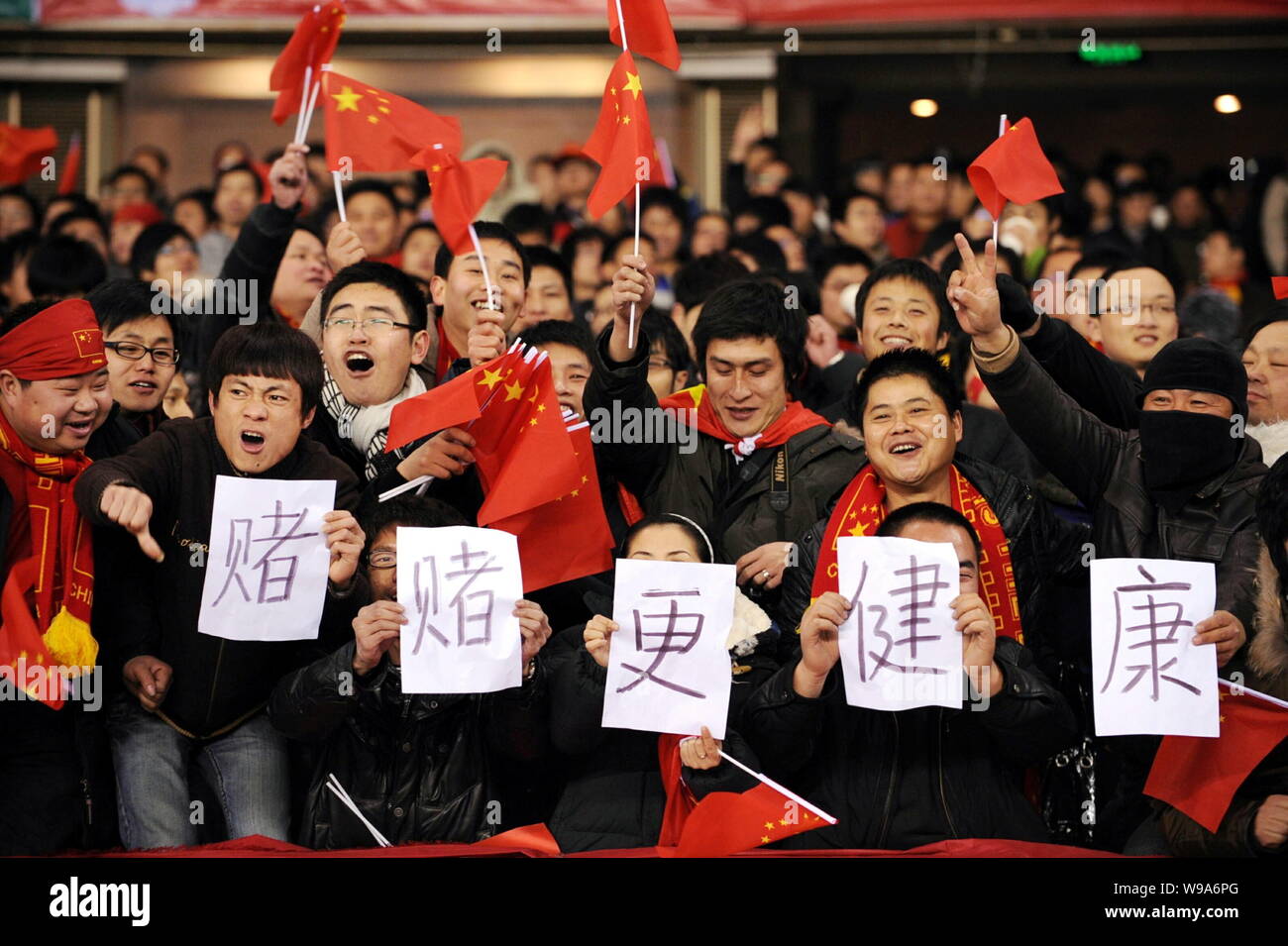 Chinese soccer fans show signs meaning It Is Healthier to Gamble, to ...