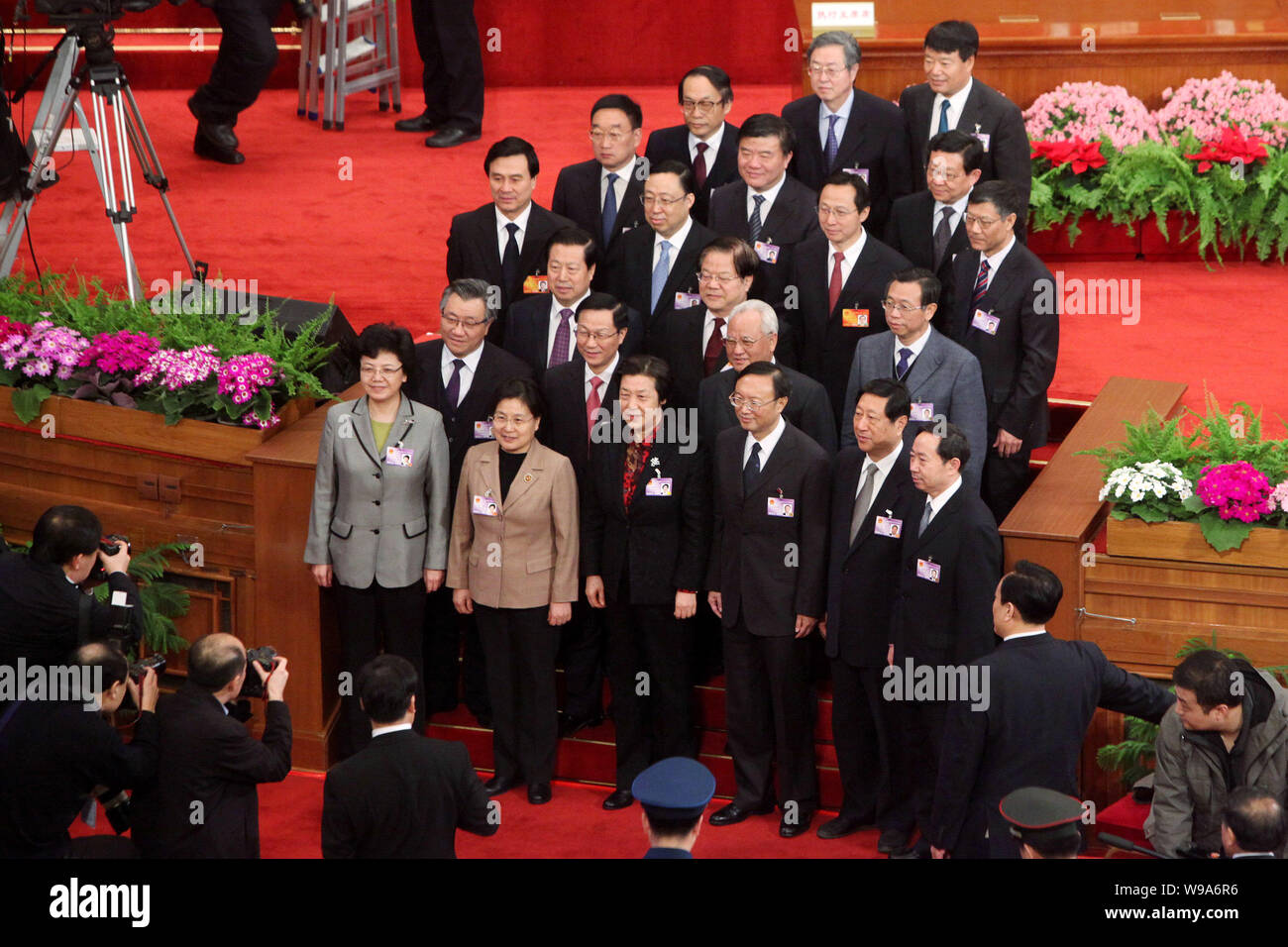 22 Chinese ministers pose for photos at the Great Hall of the People ...