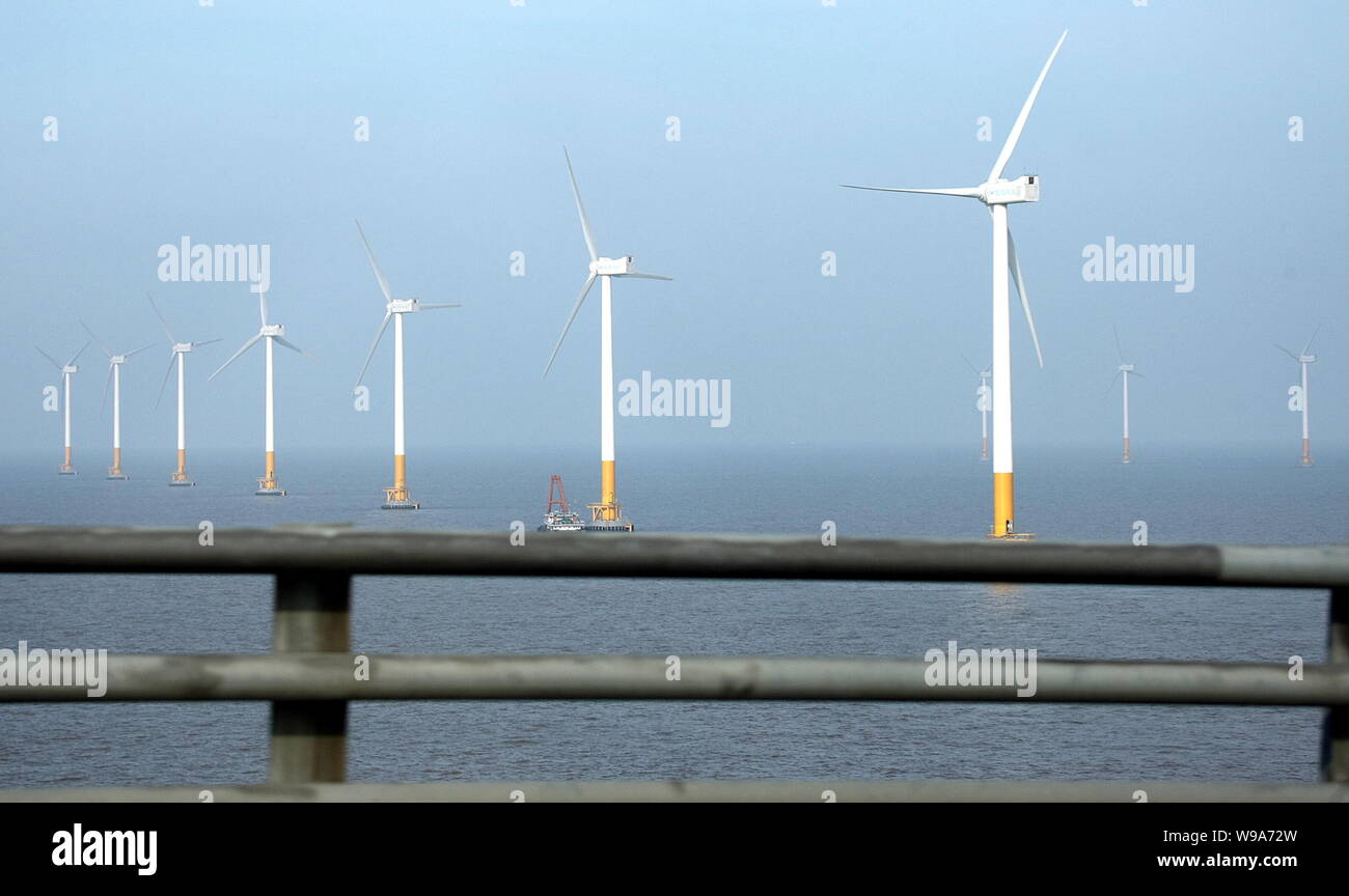 View of wind turbines at the Shanghai Donghai Bridge Offshore Wind Farm ...