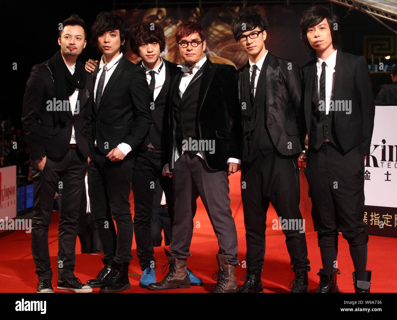Hong Kong singer Alan Tam, third right, and Hong Kong music pop group ...