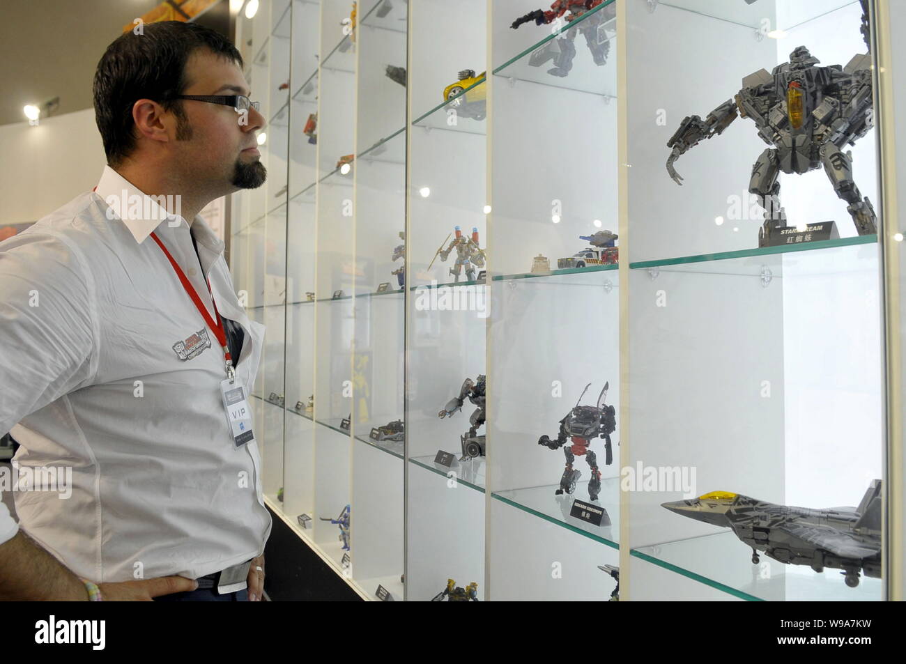 Designer Michelino Paolino of Hasbro Design looks at models of the ...