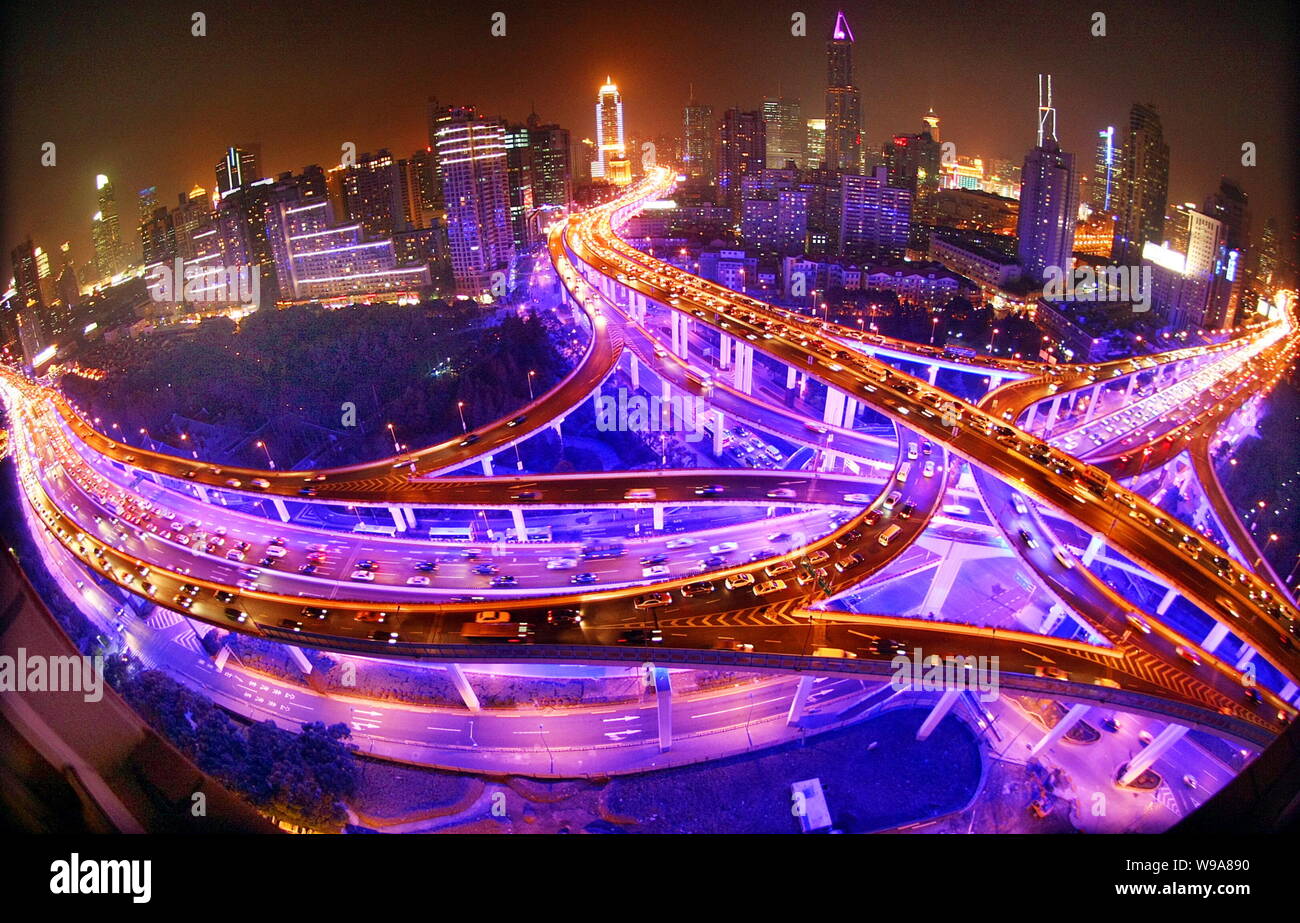 Night view of overhead highways illuminated by LED lights in Shanghai ...