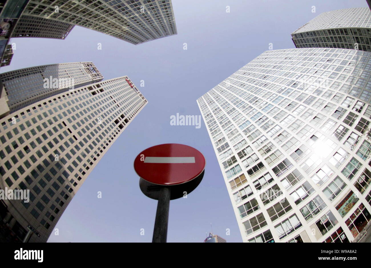 --FILE-- Fish eye view of a traffic sign amid Jianwai SOHO office ...