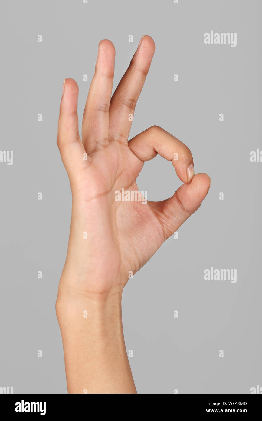 Person hand showing ok sign Stock Photo - Alamy