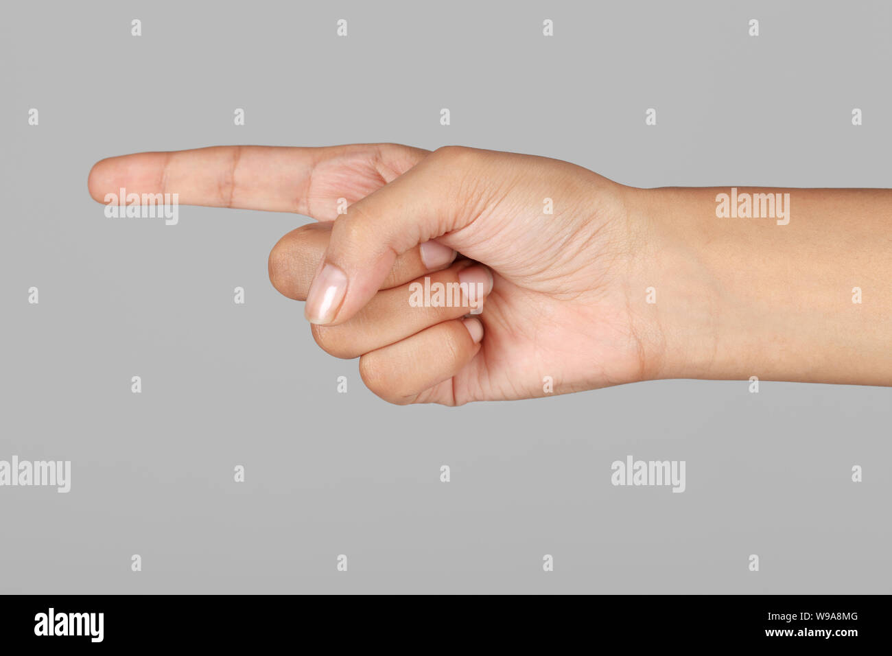 Indian female pointing finger hi-res stock photography and images - Alamy