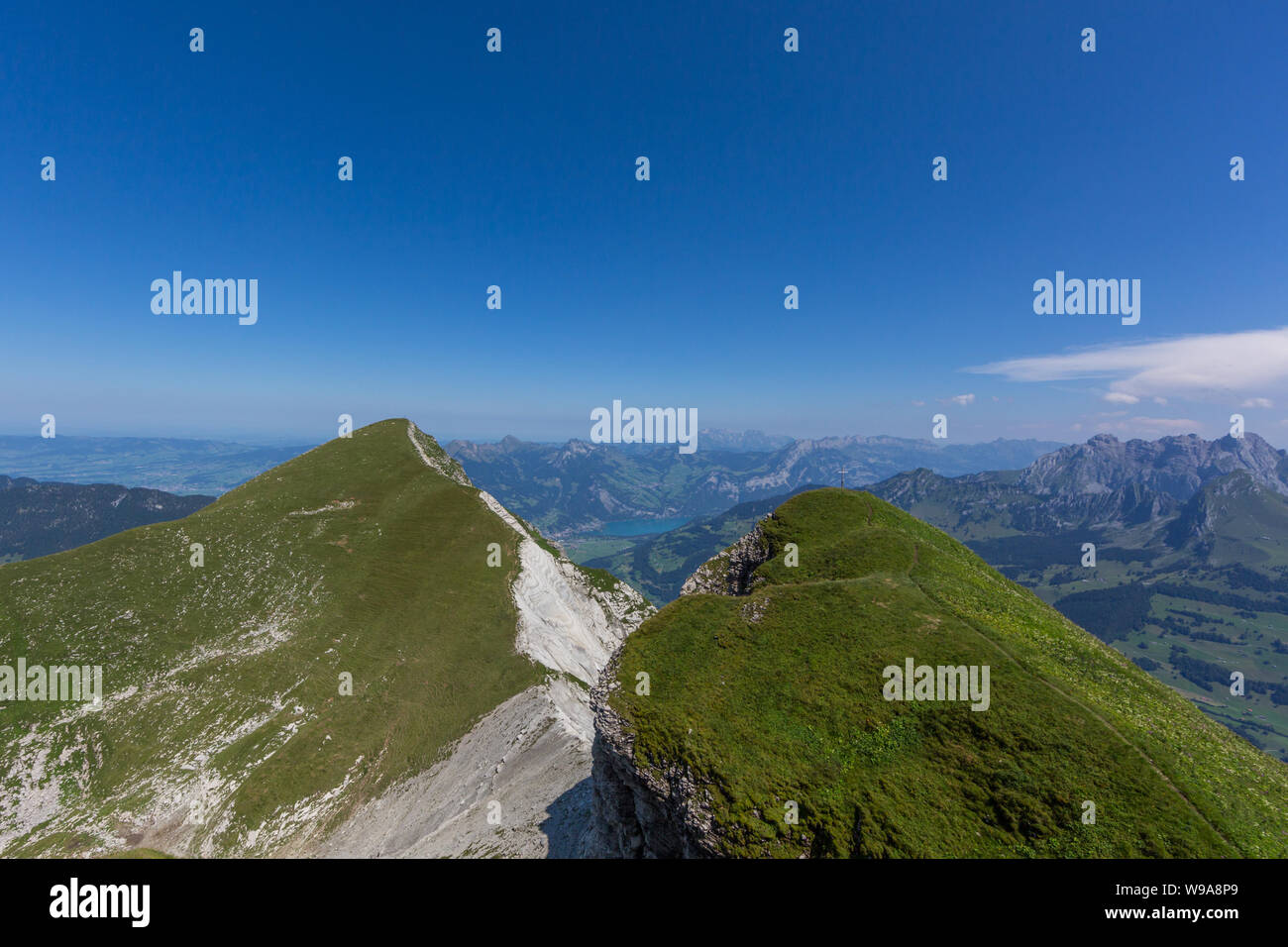 summits of Rautispitz and Wiggis mountains in swiss alps, blue sky ...
