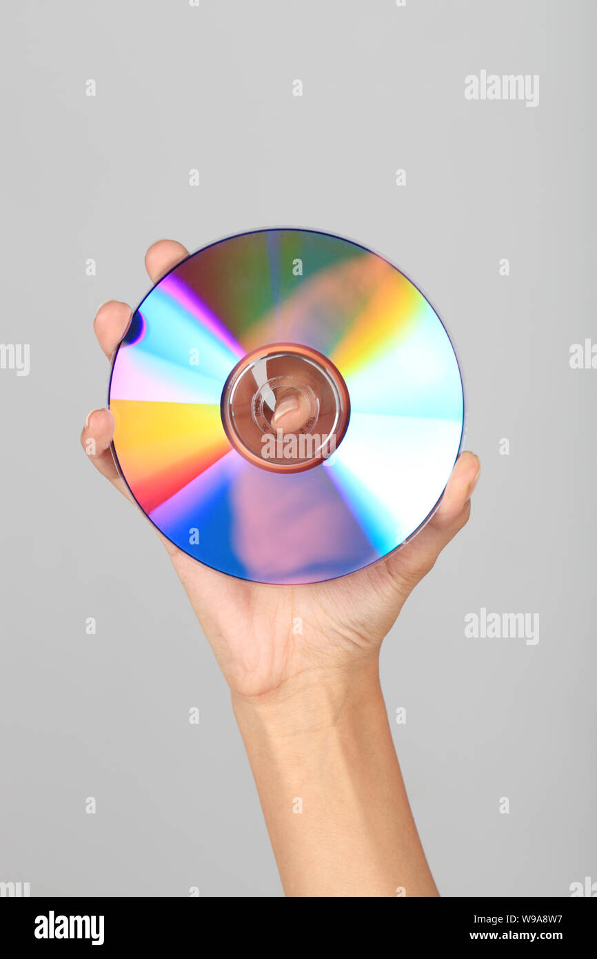 Hand holding cd hi-res stock photography and images - Alamy