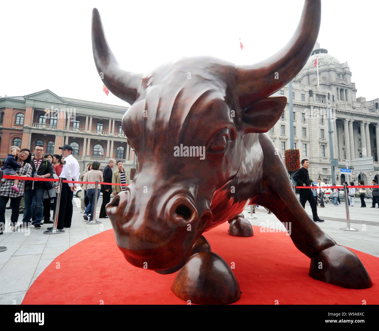 The bronze Bund Bull statue, designed by Italian-American artist Arturo ...