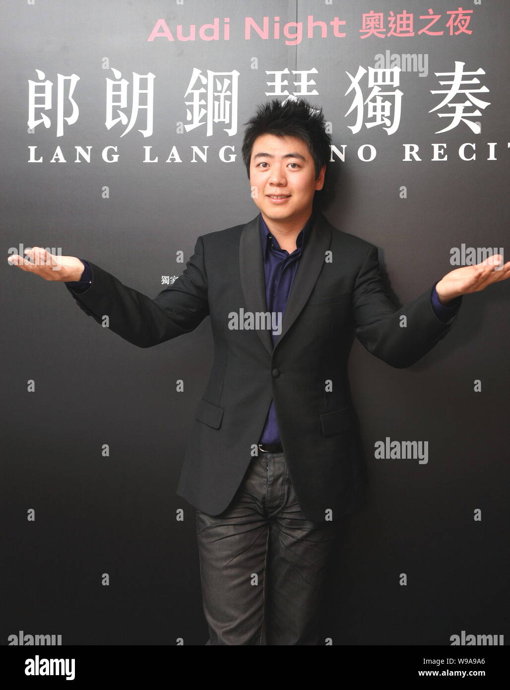 Chinese pianist Lang Lang poses at a press conference for his concert ...