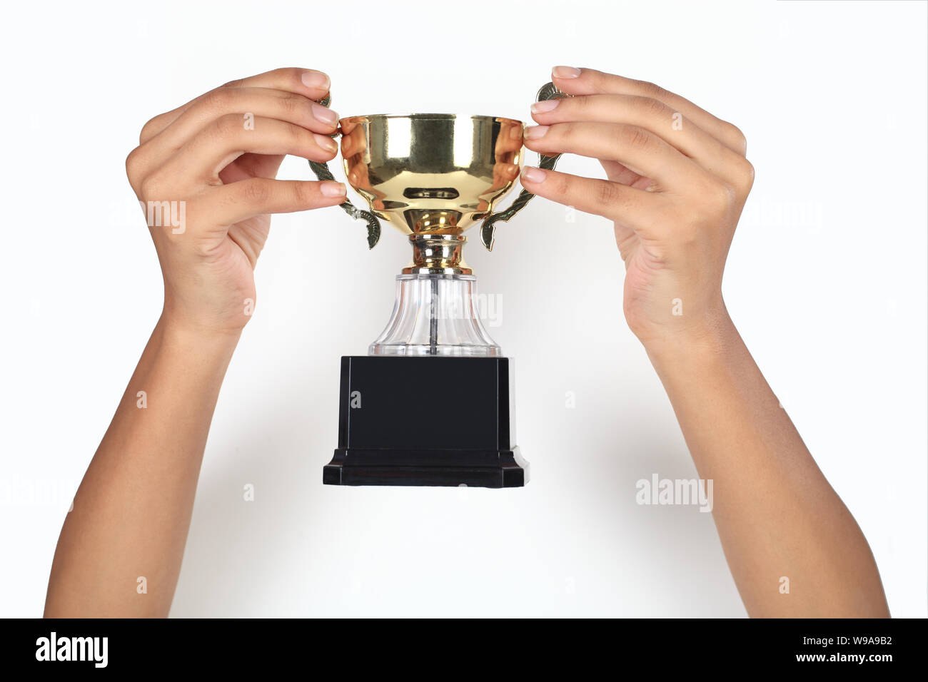 Close up of person hand showing trophy Stock Photo - Alamy