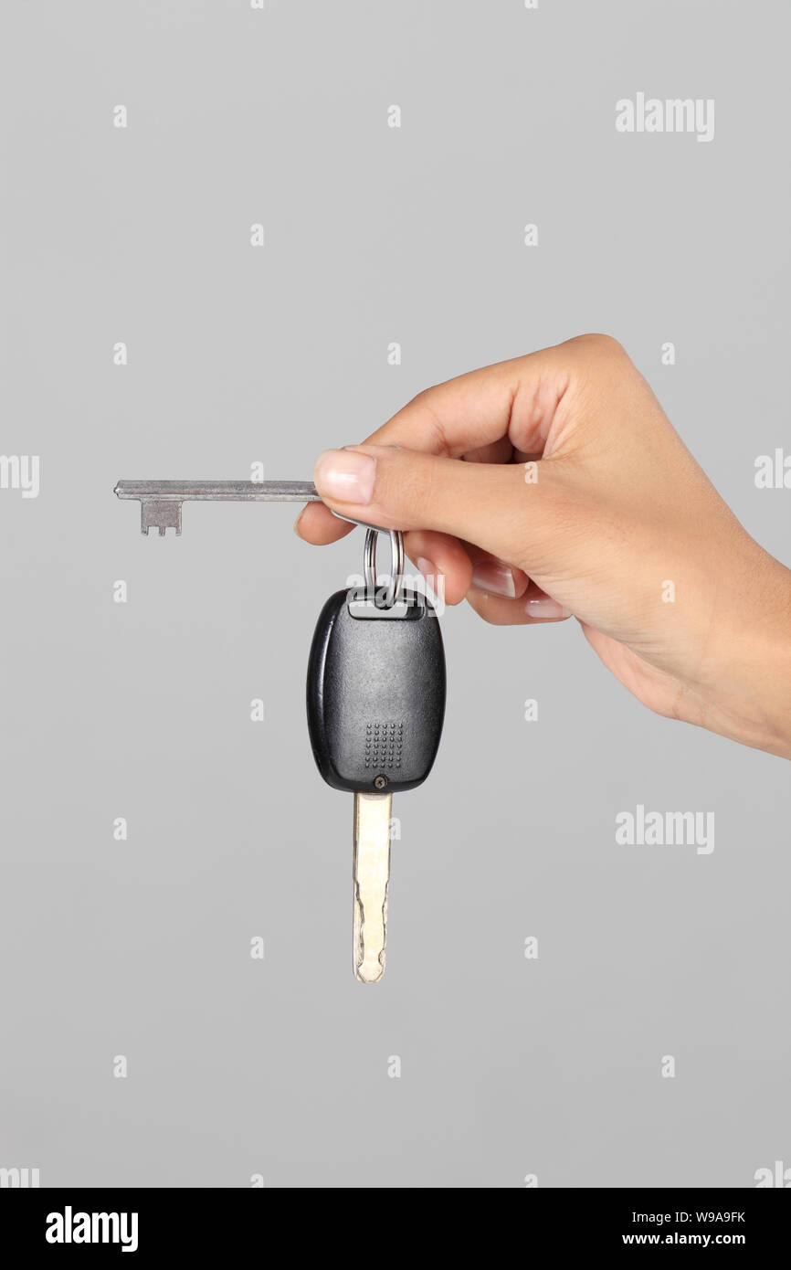 Woman holding key ring with keys hi-res stock photography and images ...