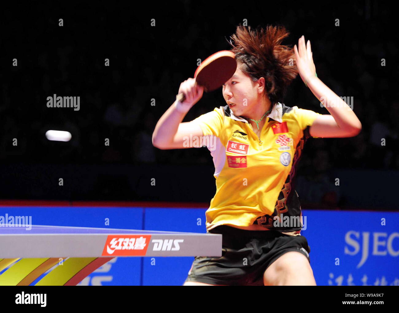 Chinas Li Xiaoxia returns a shot to Kim Kyung-ah of South Korea in the ...