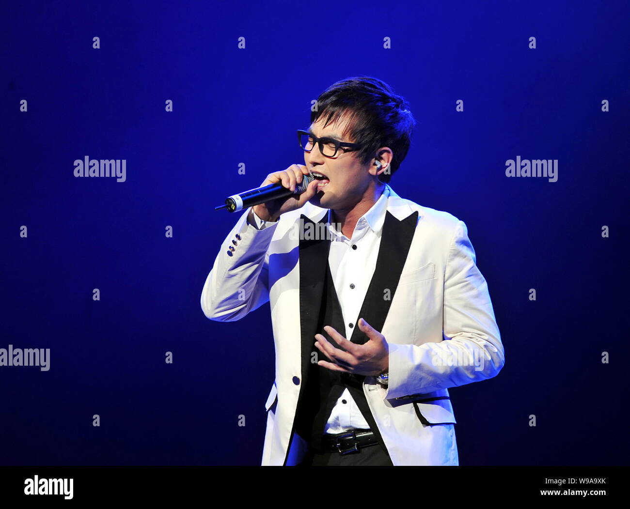 South Korean singer Kangta performs during a celebration for the Week ...