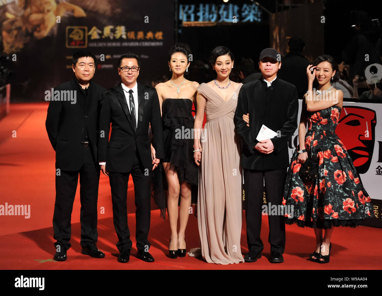 Chinese director Feng Xiaogang, second right, actresses Zhang Jingchu ...