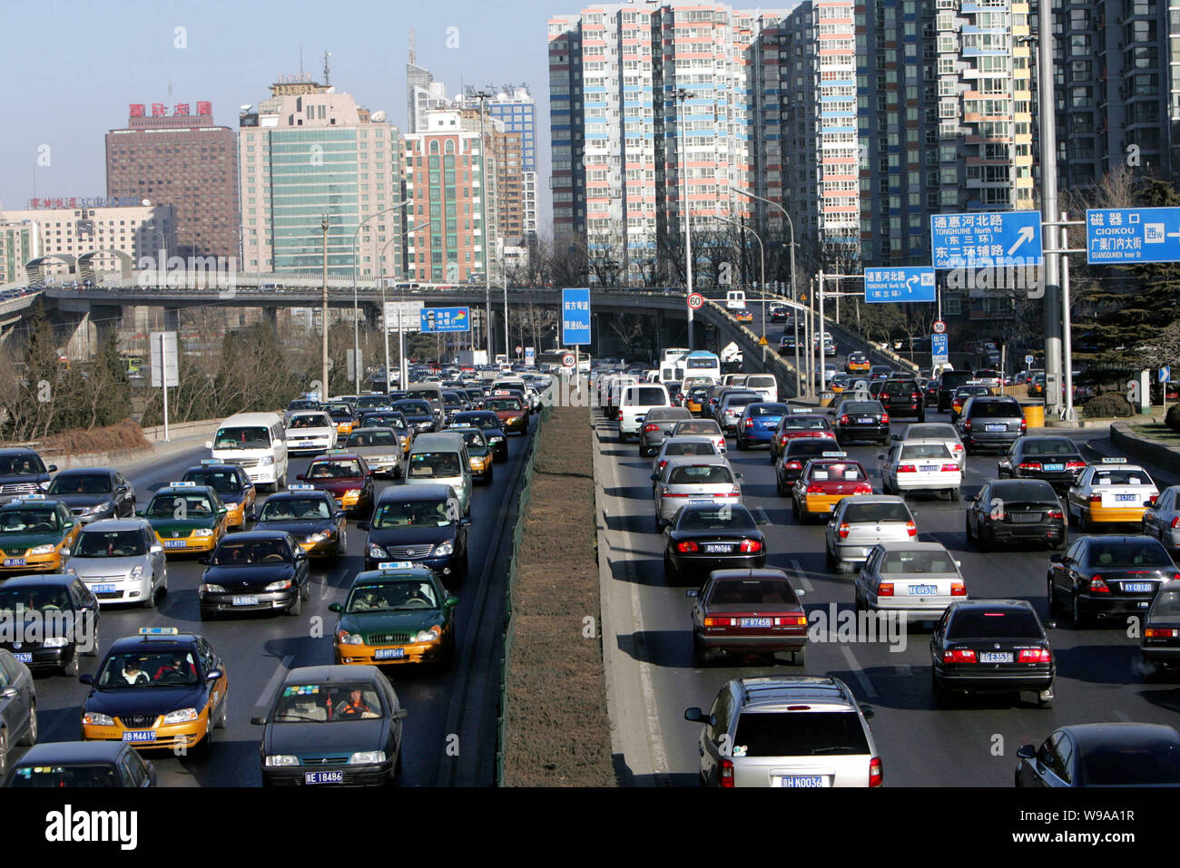 Cars move slowly during the rush hour in Beijing, China, December 23 ...
