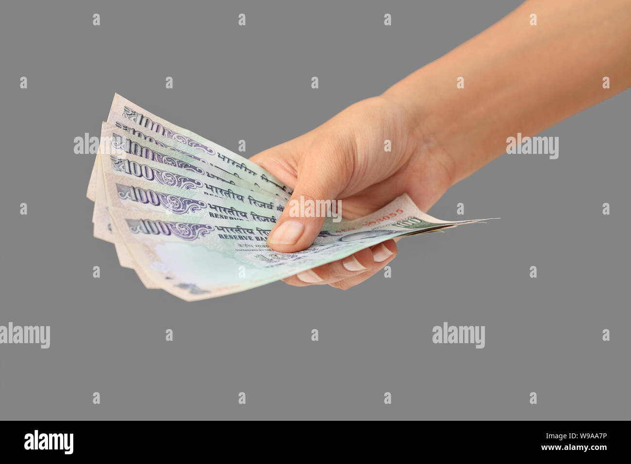 Indian rupee banknotes hand hi-res stock photography and images - Alamy