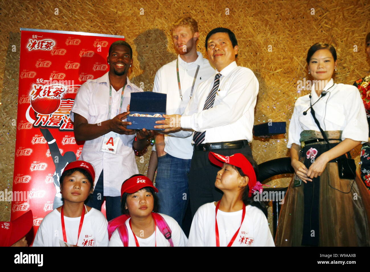 NBA basketball players Chase Budinger, back second left, and Aaron ...