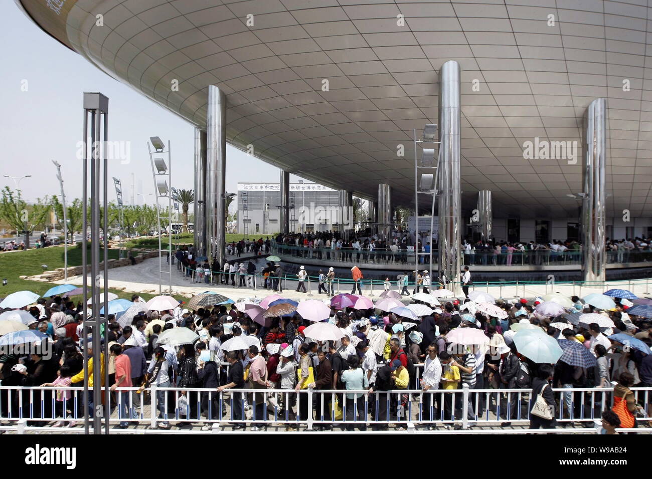 Crowds of visitors queue up to enter the Saudi Arab Pavilion in the ...