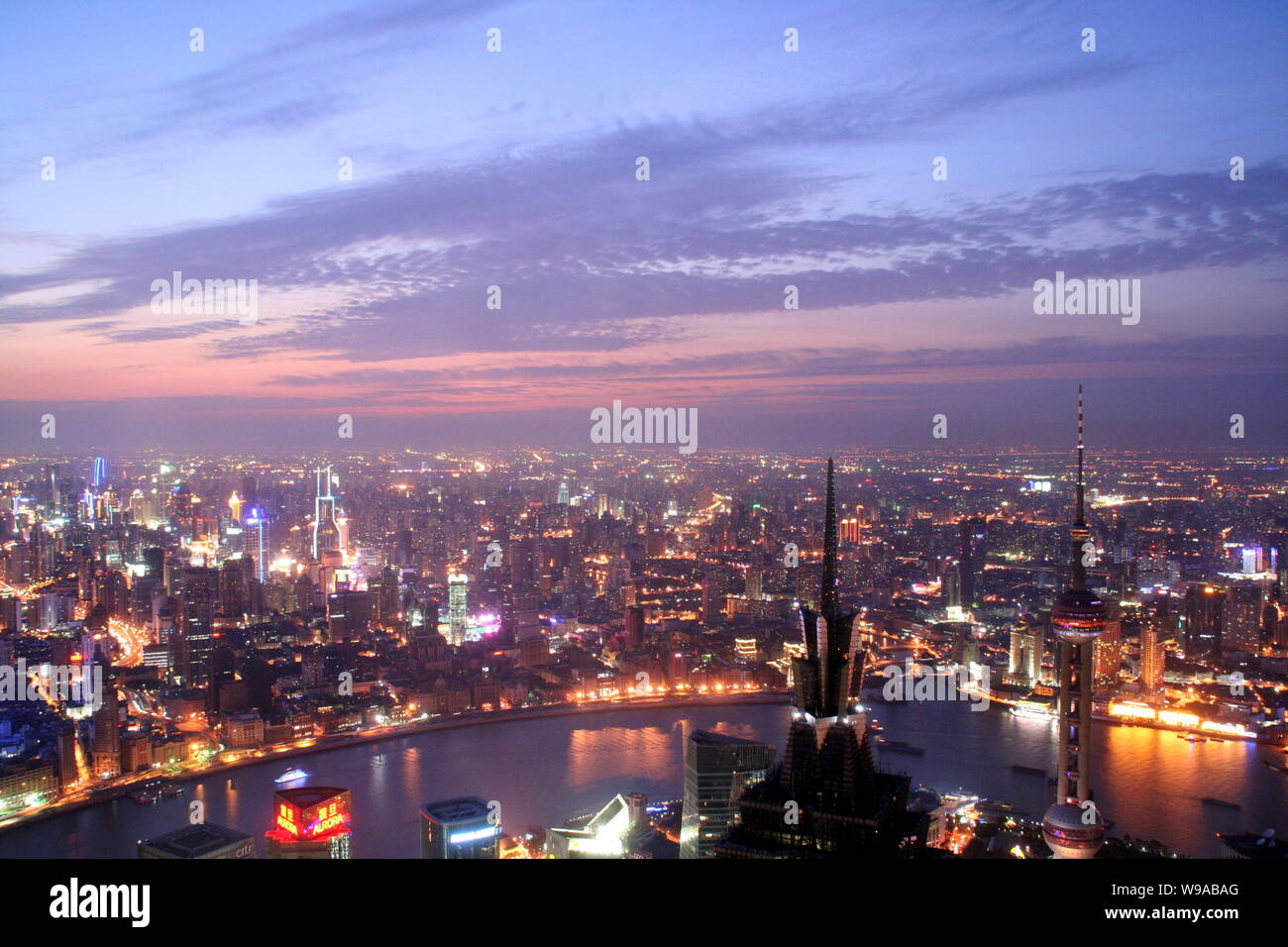 --FILE--Night view of the Huangpu River and Puxi area in Shanghai ...