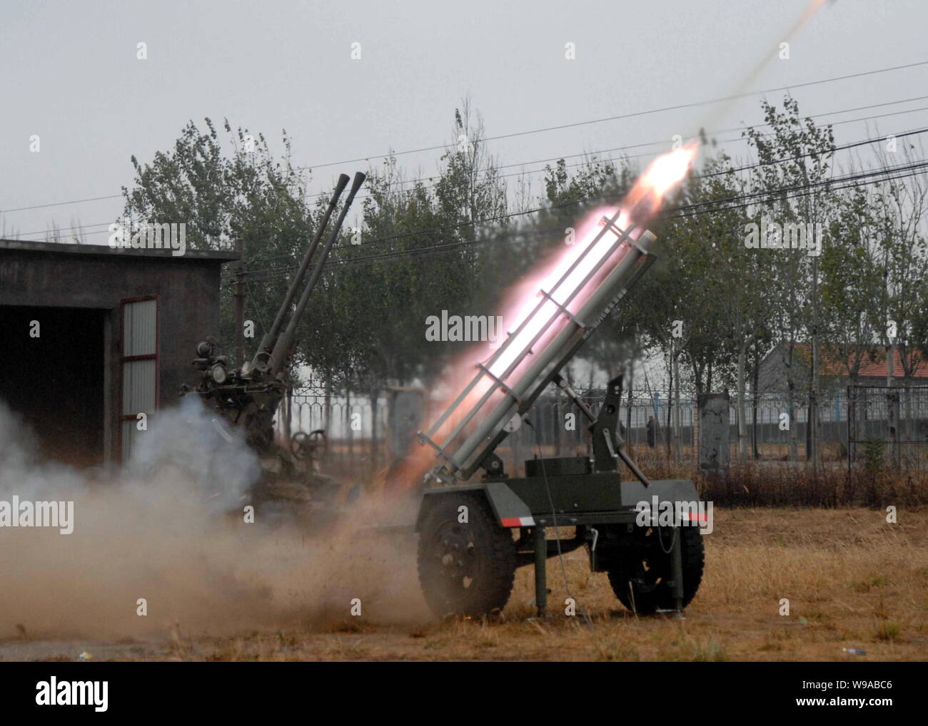 A rocket is launched for cloud seeding and rainmaking to ease the ...