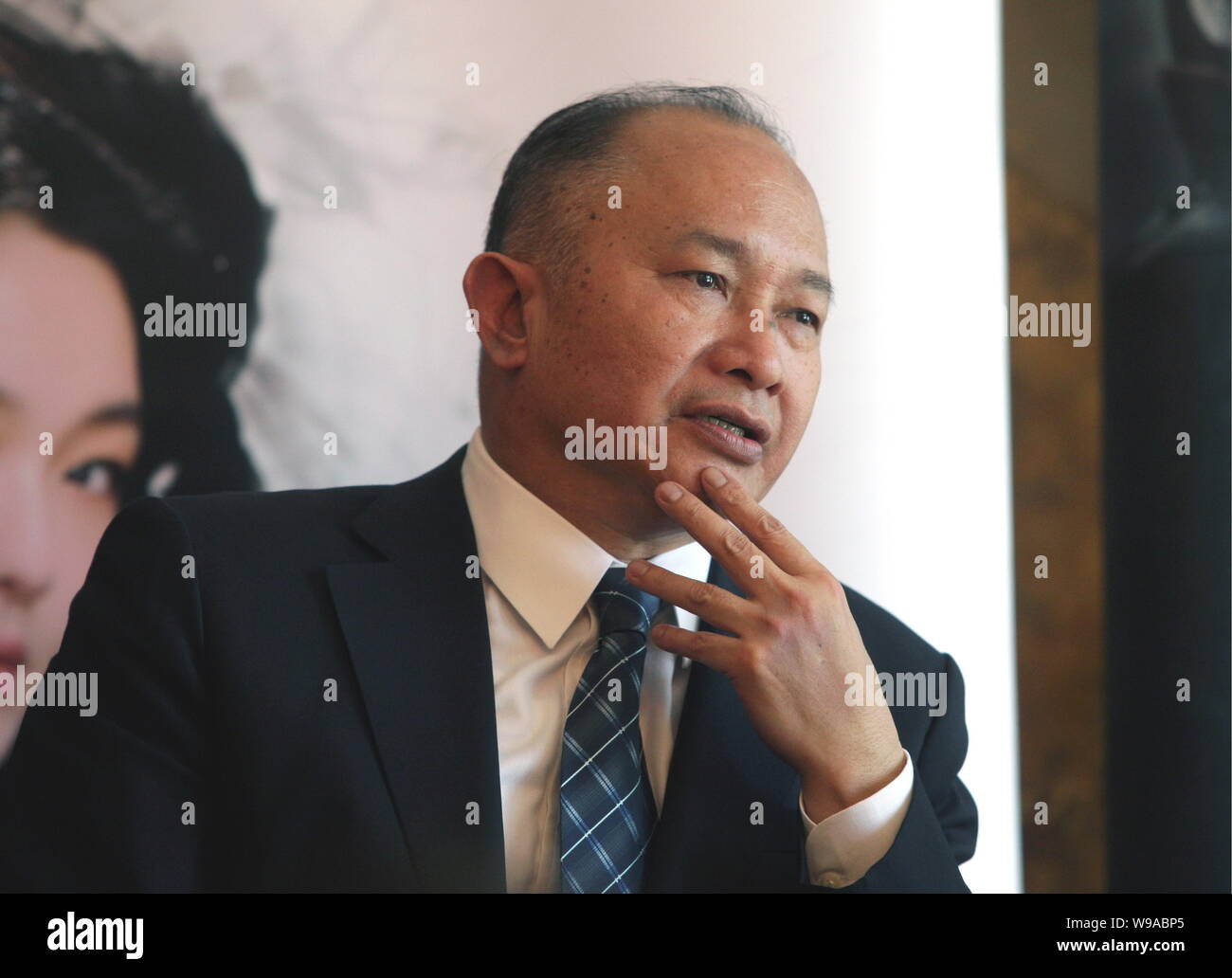 Hollywood film director John Woo is seen at a press conference for his ...