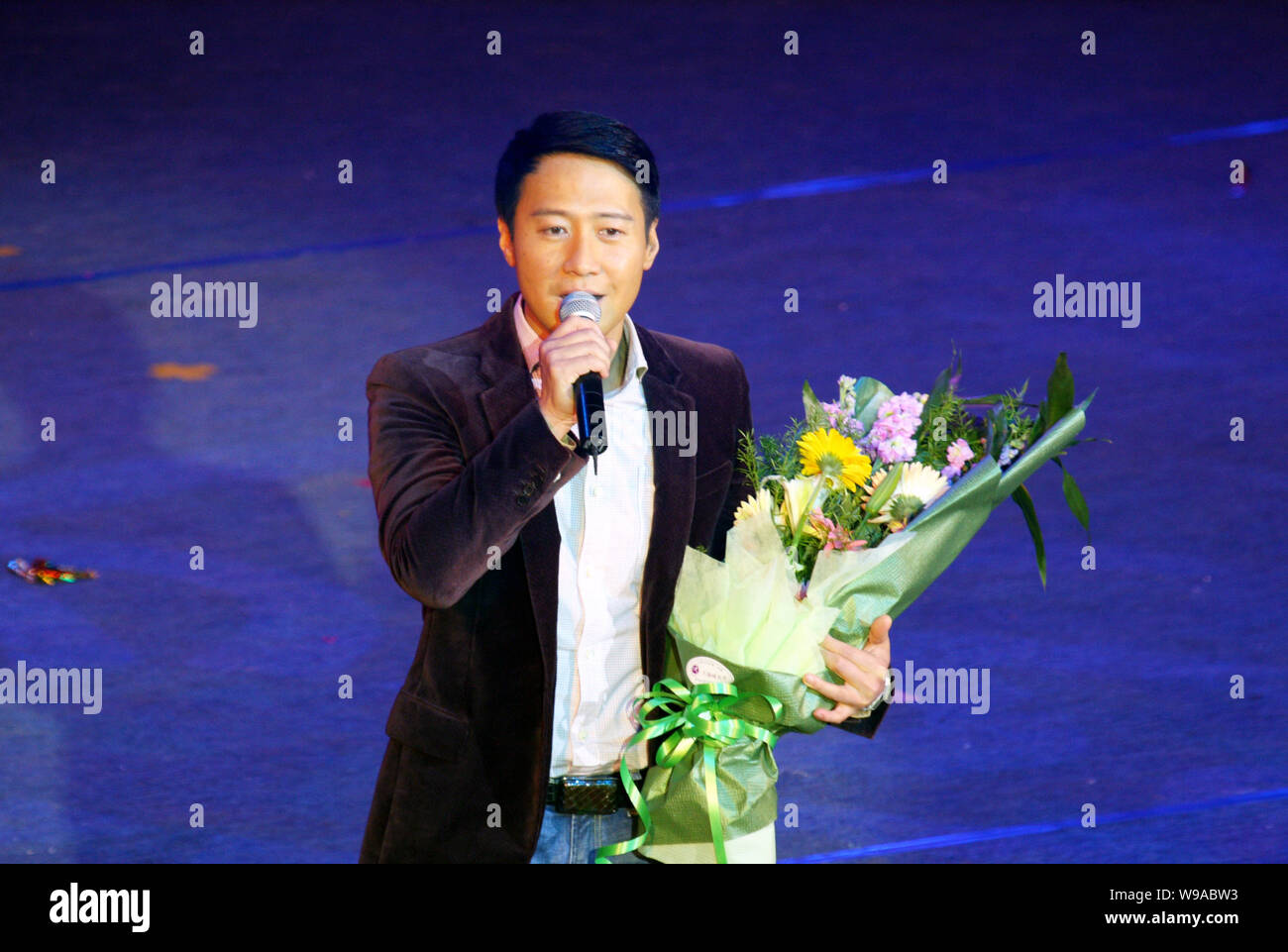 Hong Kong actor and singer Leon Lai performs at a ceremony to celebrate ...